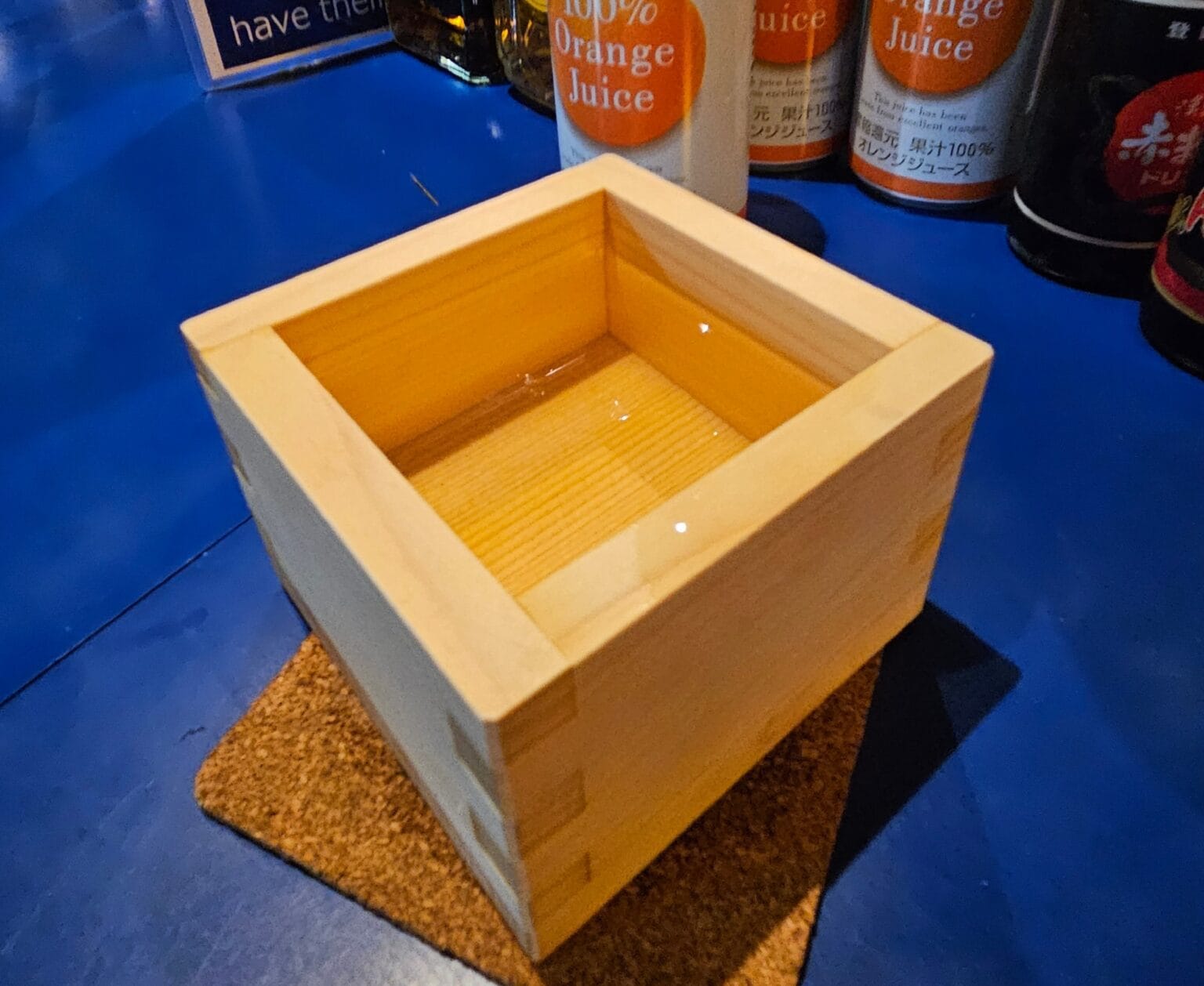 Why Do Japanese Overfill Sake in Wooden Masu Box?